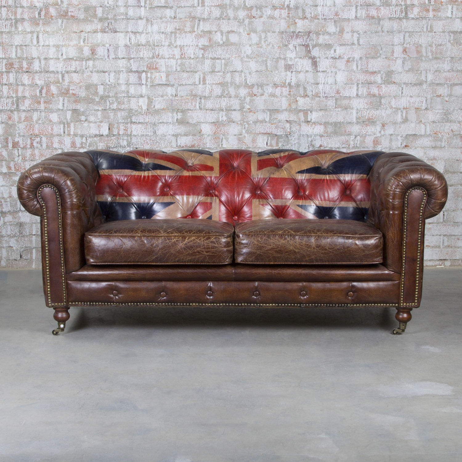 Sofá cuero 2ptos capitoneado bandera - Ambiente Gourmet | Ambiente Living